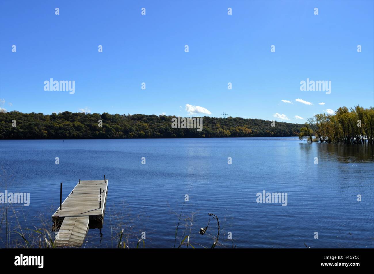 Dock in the River Stock Photo - Alamy
