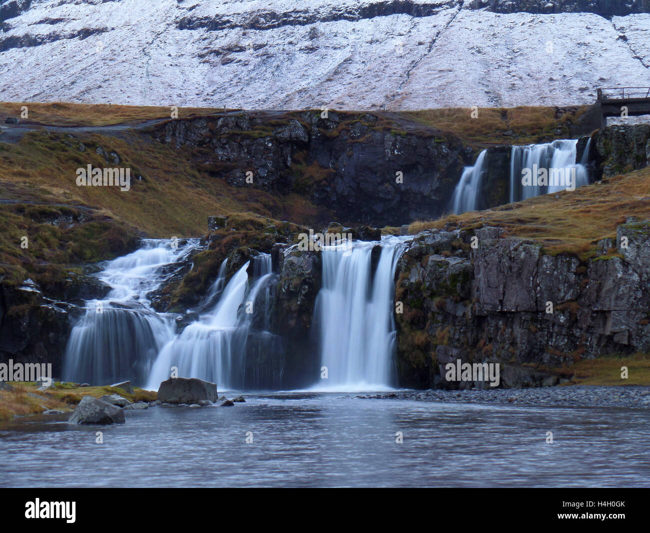 Scenic Kirkjufellsfoss waterfall in early winter, Snaefellsness ...