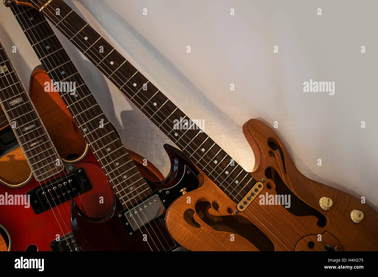 Four guitars hi-res stock photography and images - Alamy