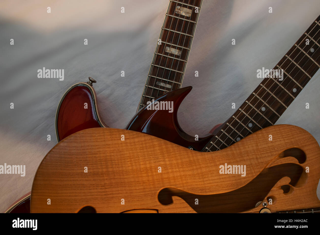 Arrangement for three guitars Stock Photo - Alamy