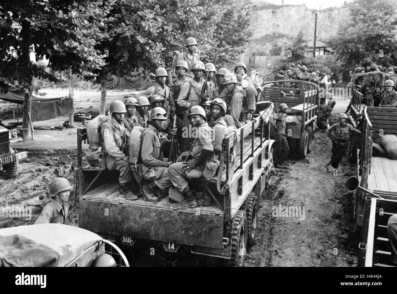 U.S. soldiers with the 24th Infantry Division are trucked to the front ...