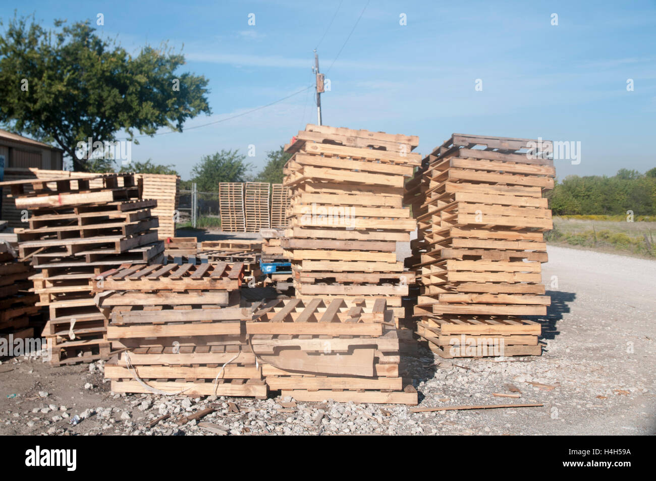Wooden pallets by the roadside Stock Photo - Alamy