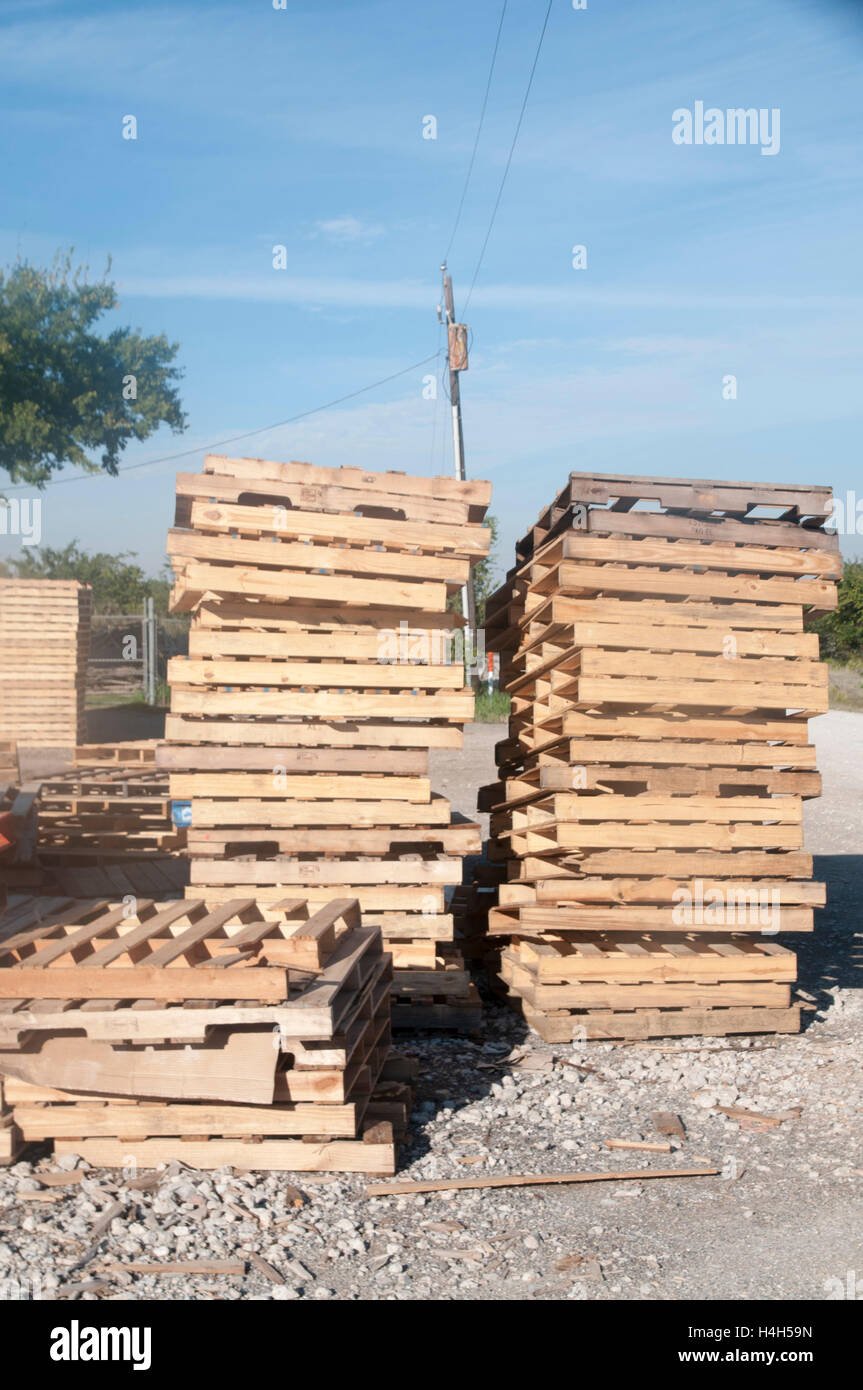Wooden pallets by the roadside Stock Photo - Alamy