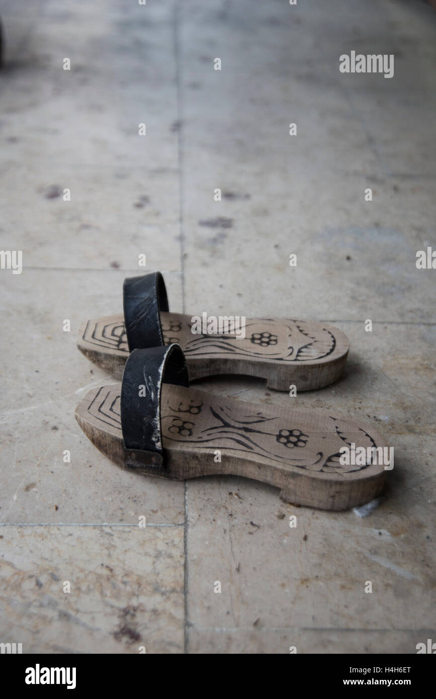 Clogs.Clogs are muslim shoes. Muslims are wear it while ablutioning ...