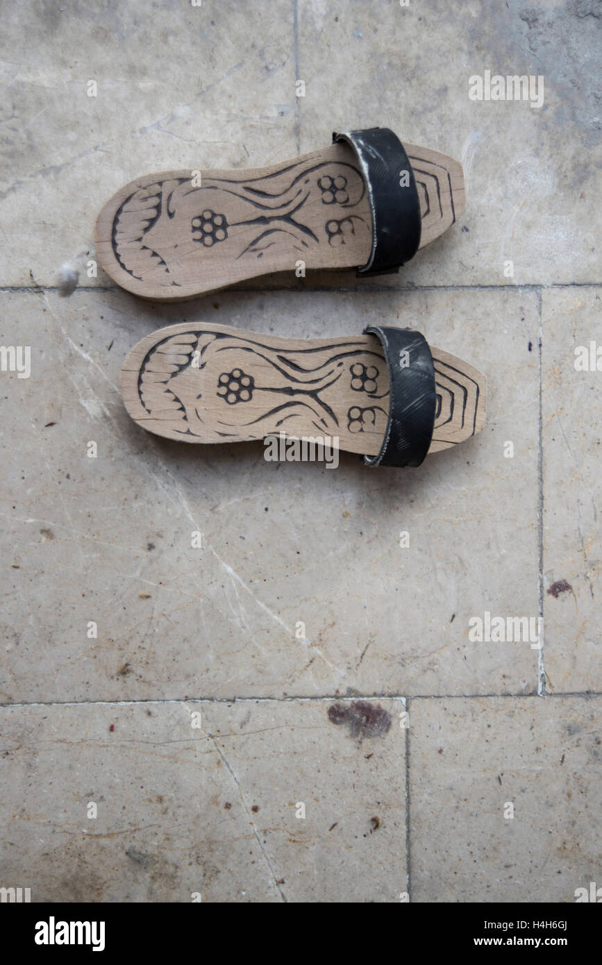 Clogs.Clogs are muslim shoes. Muslims are wear it while ablutioning ...