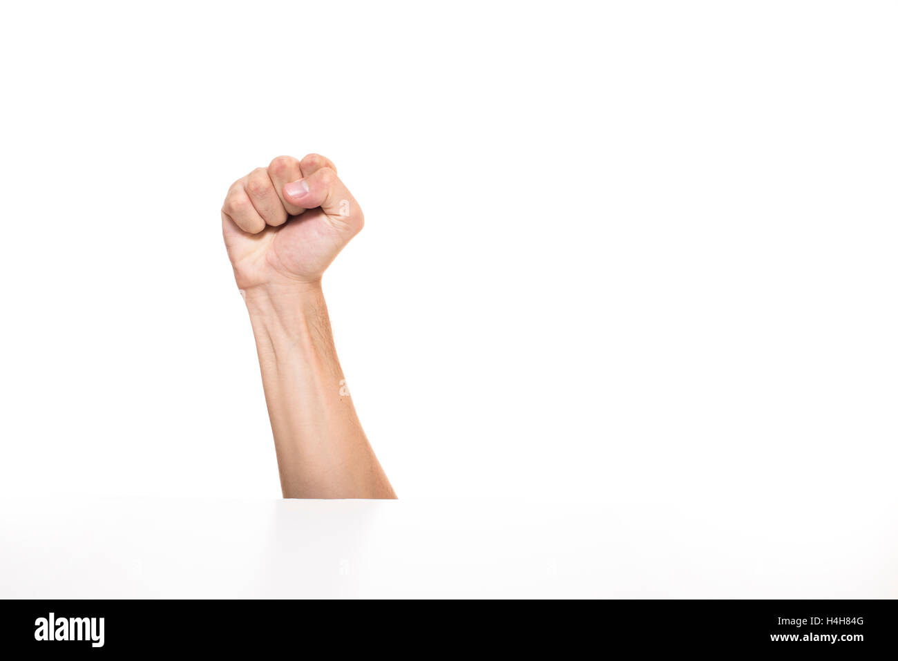 Clenched right fist isolated on a white background Stock Photo - Alamy