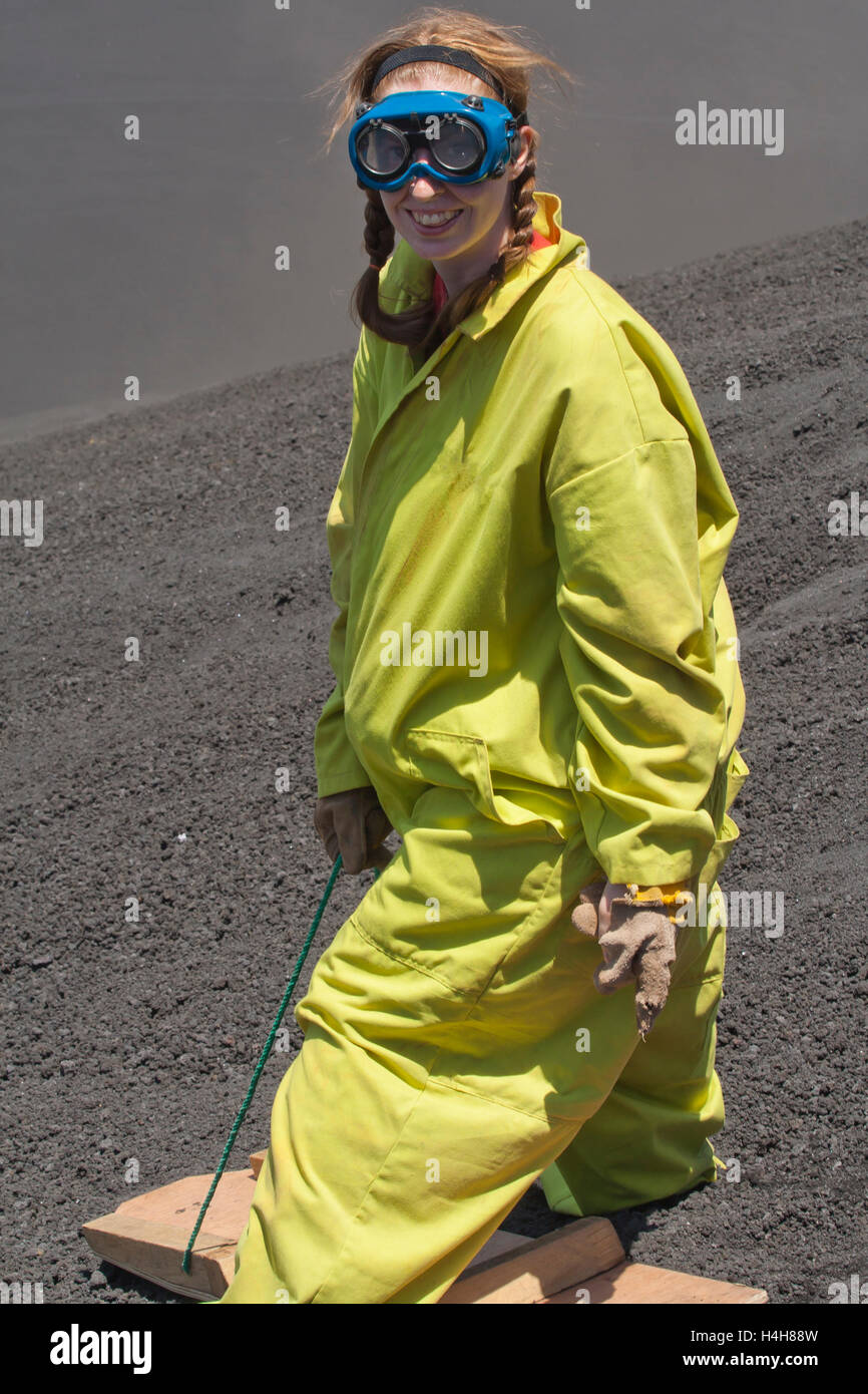 A girl dressed up and ready to go volcano boarding Stock Photo - Alamy
