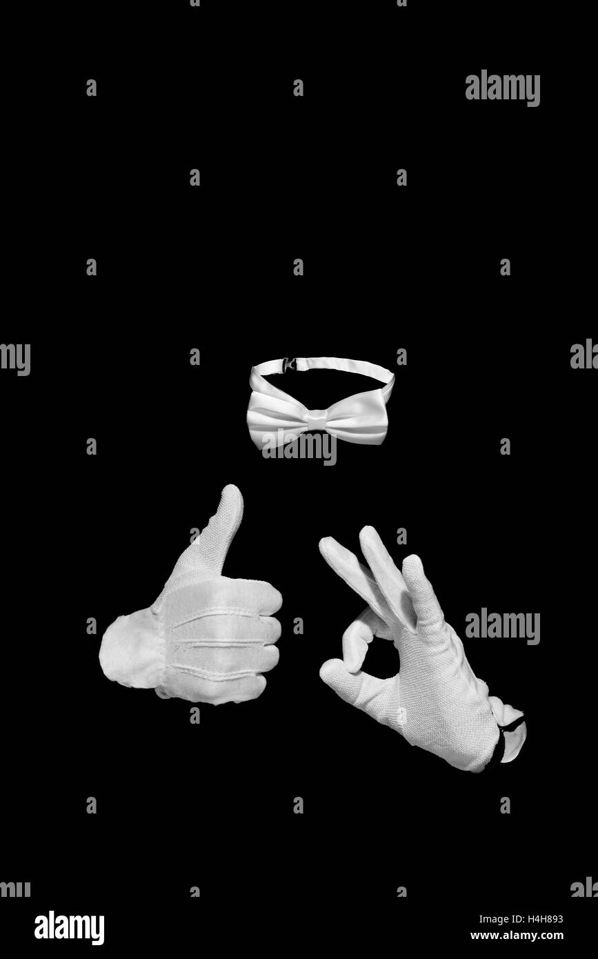Thumbs up. Invisible man figure is shwing ok sign, with white bow tie ...