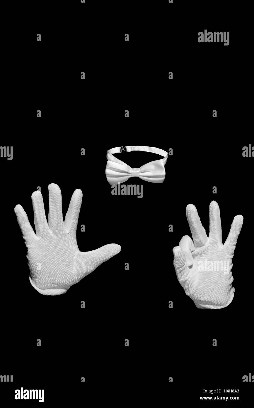Glove middle finger hand Black and White Stock Photos & Images - Alamy