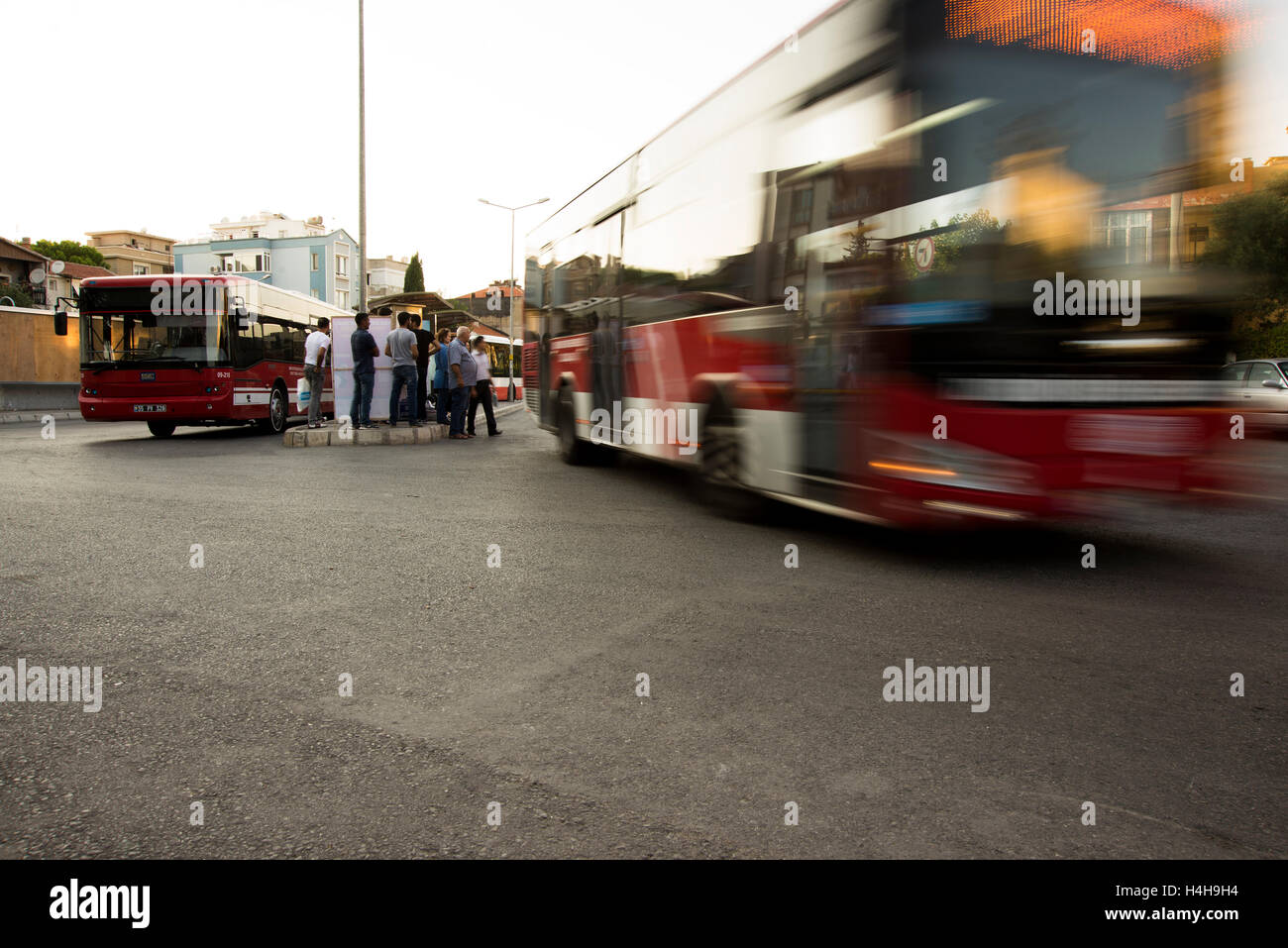 Crowded people in the bus station. They are waiting for thebus and ...
