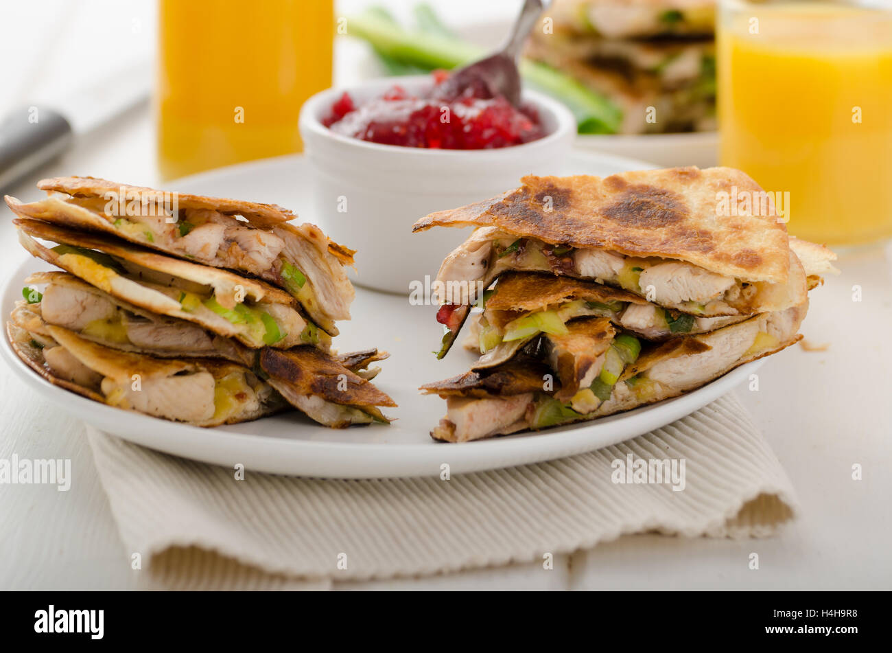 Turkey quesadillas with currant sauce, fresh orange juice Stock Photo ...