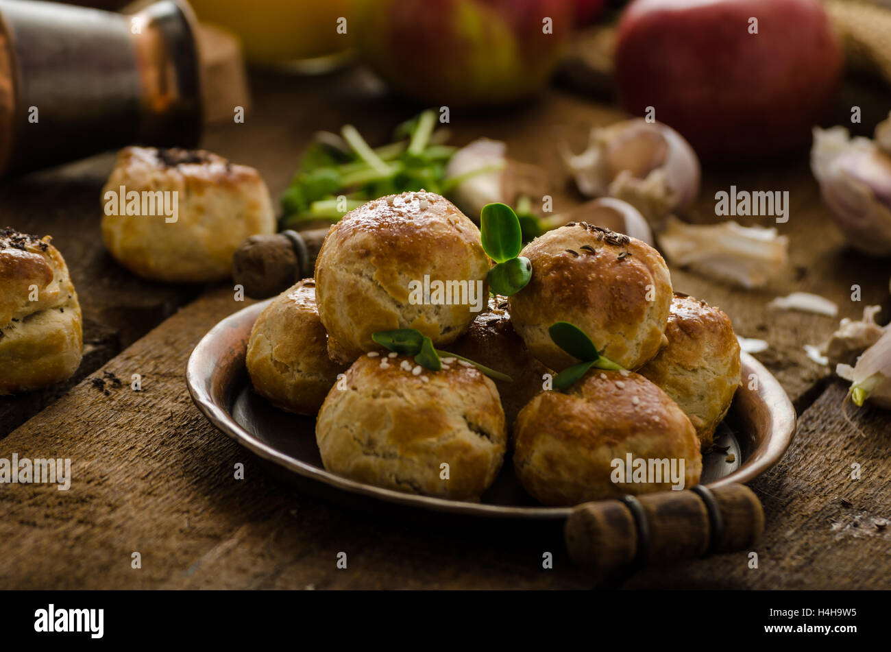 Cheese mini buns from home dough, sprinkled with sesame seeds, poppy ...