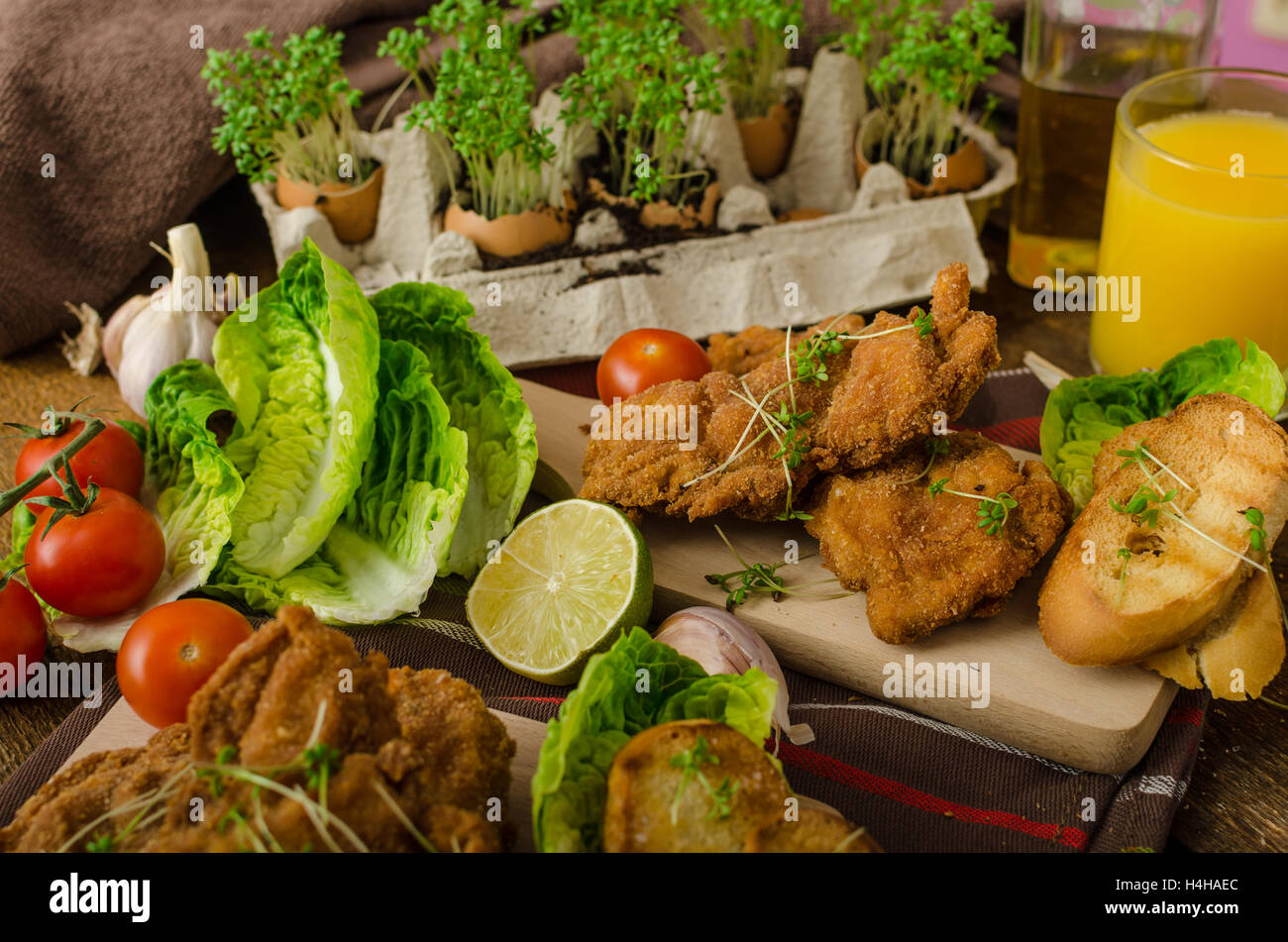 Mini cutlets - schnitzels of chicken legs meat and fresh salad and ...