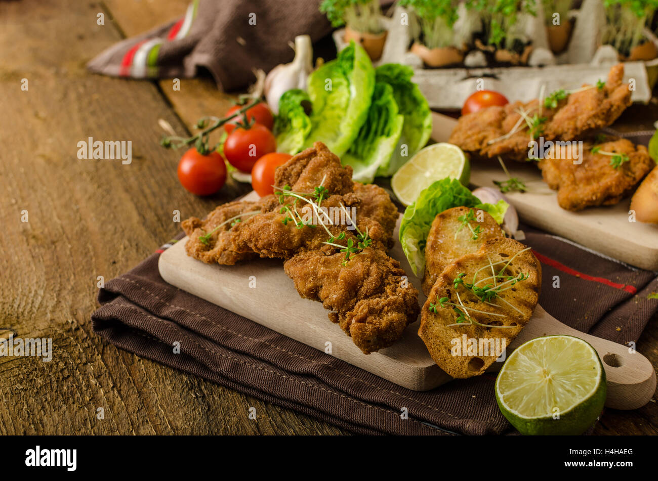 Mini cutlets - schnitzels of chicken legs meat and fresh salad and ...