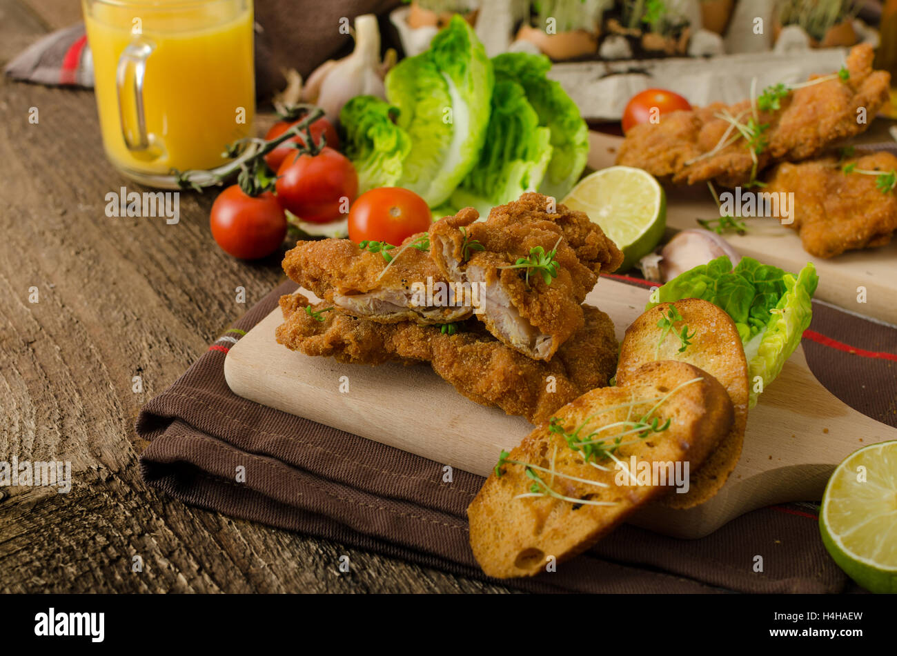 Mini cutlets - schnitzels of chicken legs meat and fresh salad and ...