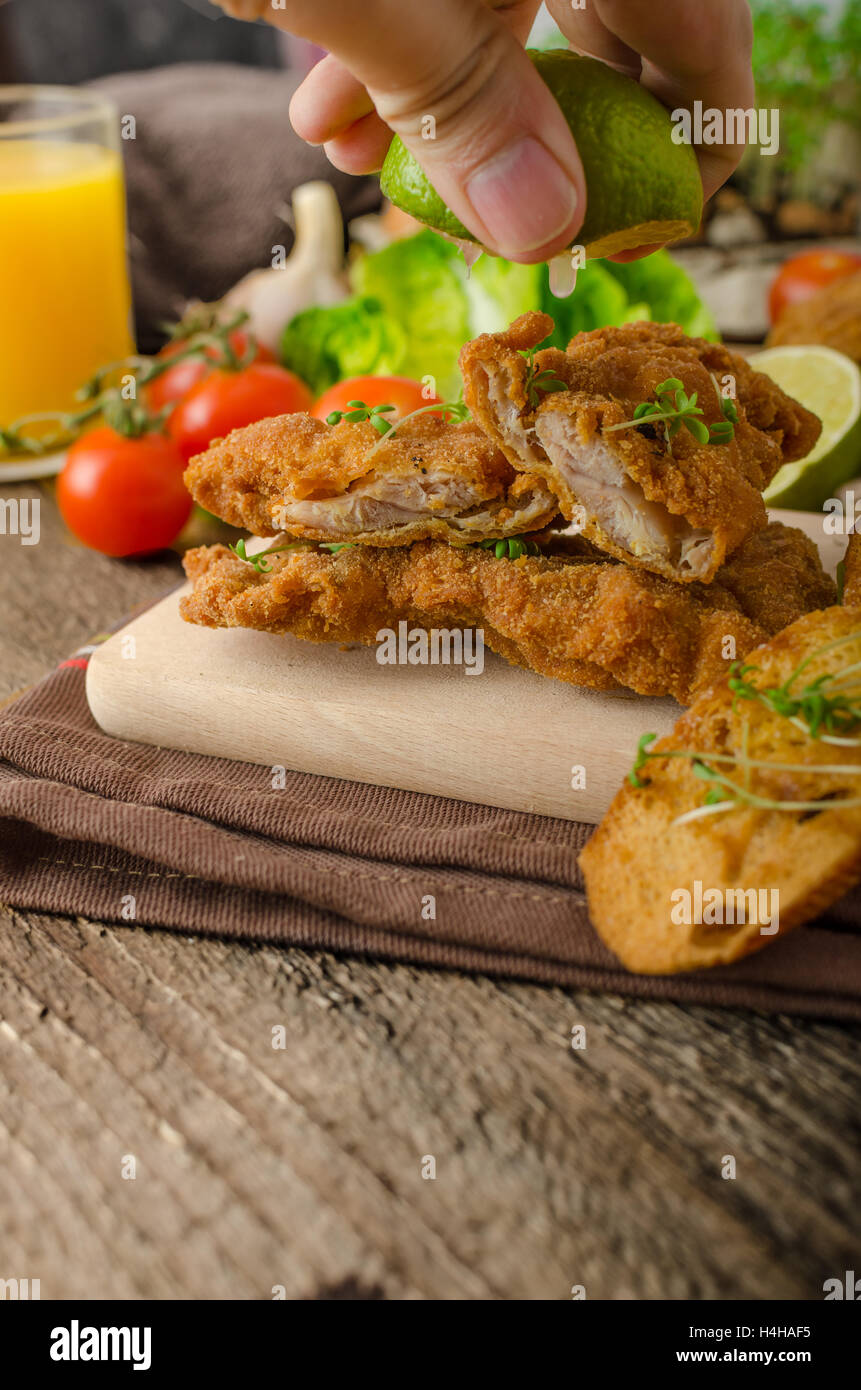 Mini cutlets - schnitzels of chicken legs meat and fresh salad and ...