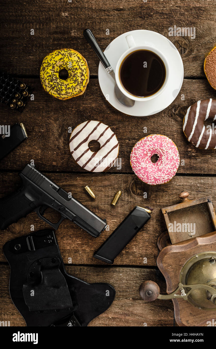 American police officer morning, donuts, juice, fresh black coffee and ...