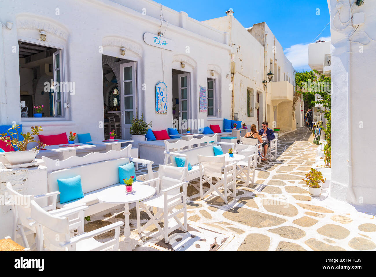 NAOUSSA VILLAGE, PAROS ISLAND - MAY 18, 2016: a view of street with ...
