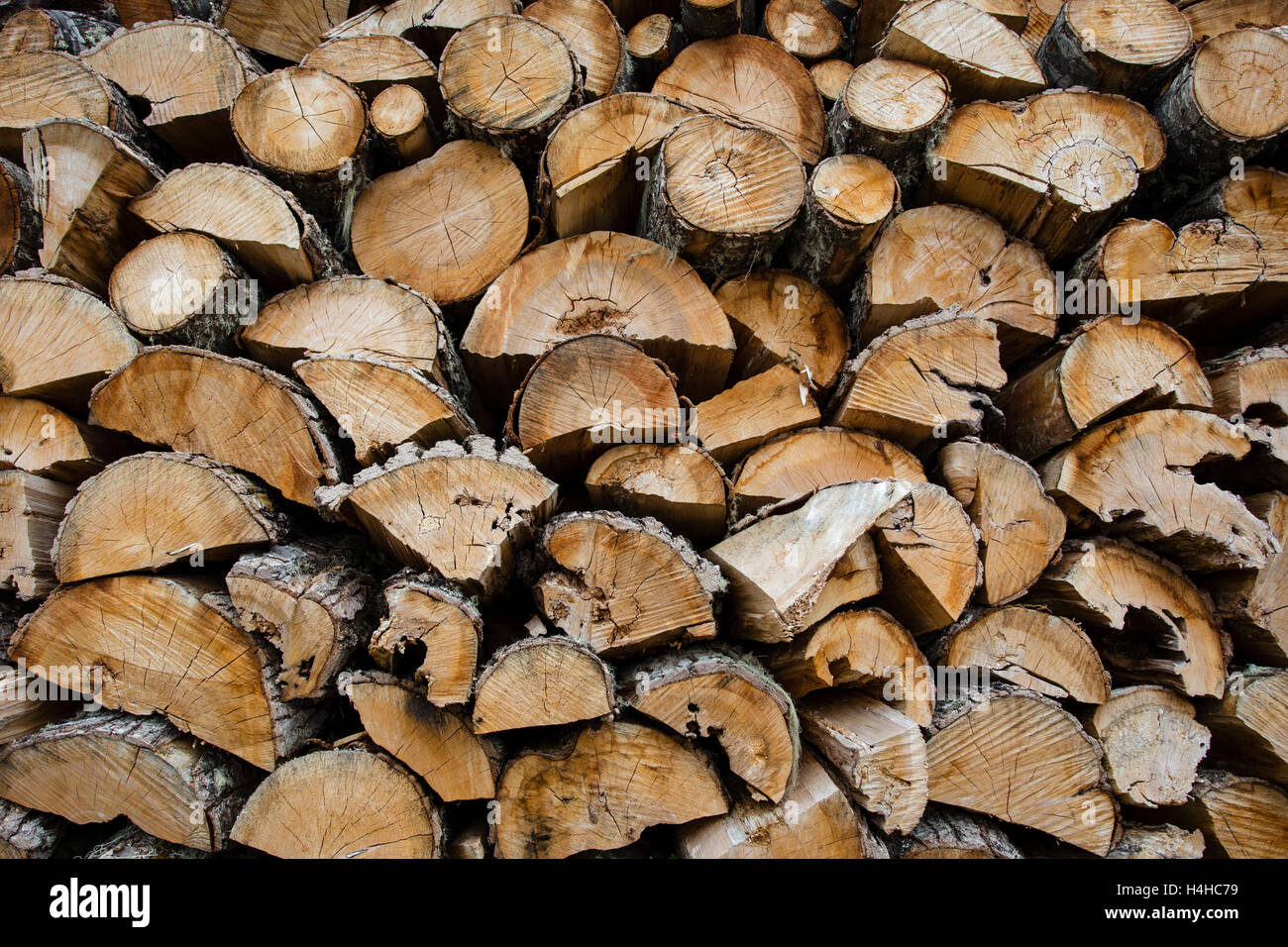 A stack of chopped wood for burning Stock Photo - Alamy