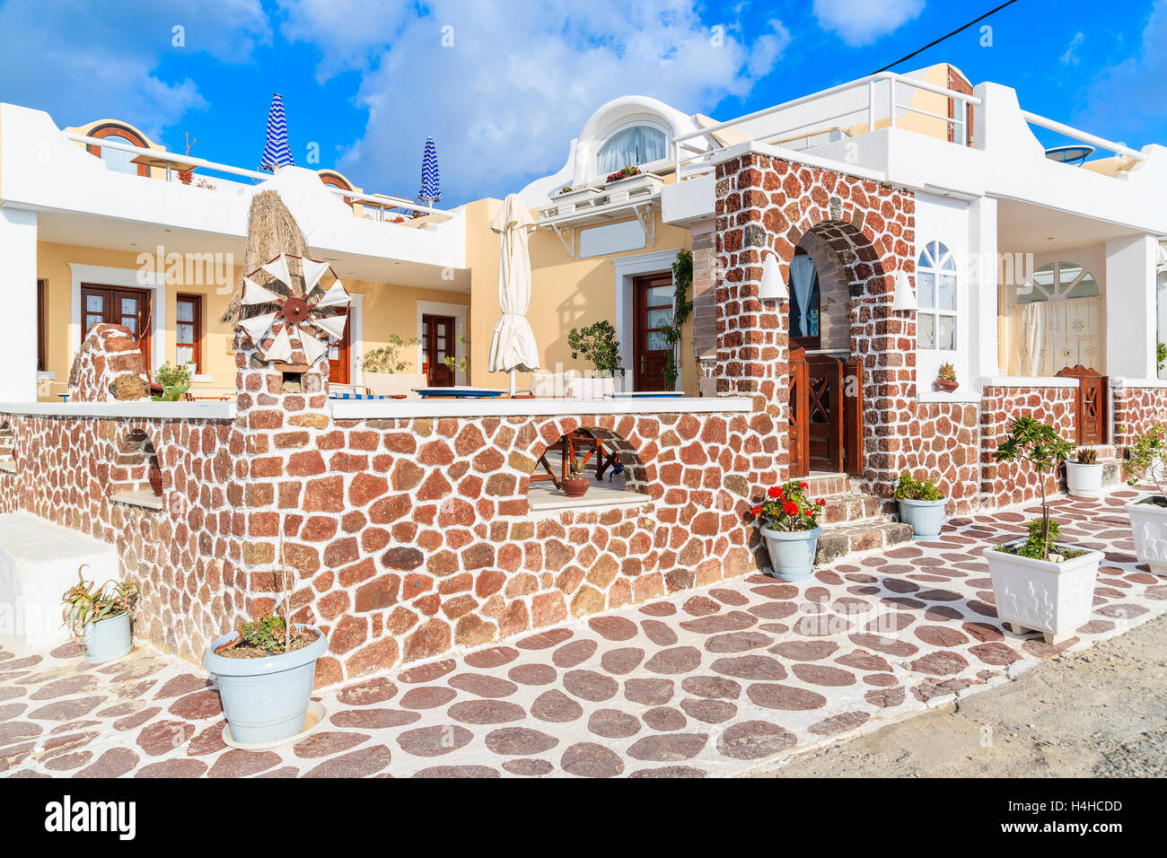 Traditional Greek house built from volcano stones in Imerovigli village ...