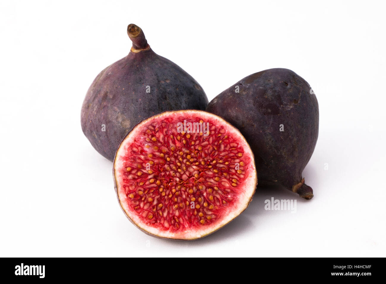 Two ripe fig fruits Cut Out Stock Images & Pictures - Alamy