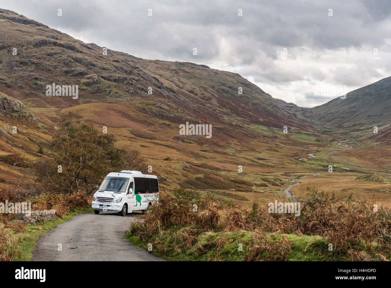 A Mountain Goat country bus on the Hardknott Pass Stock Photo - Alamy