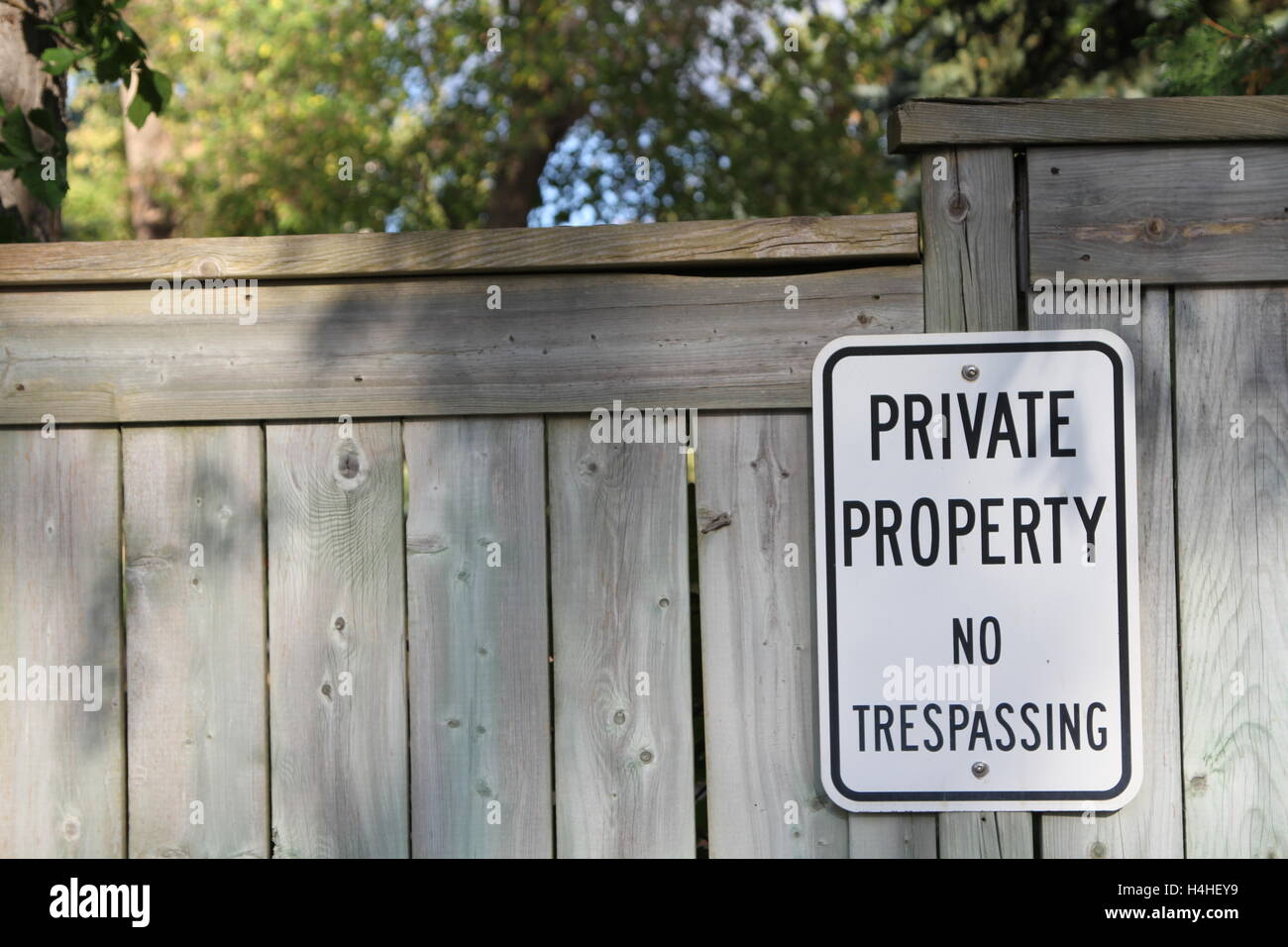 Sign on a fence Stock Photo - Alamy