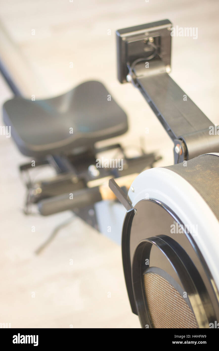 Gym exercise rowing machine static rower in gymnasium fitness studio ...