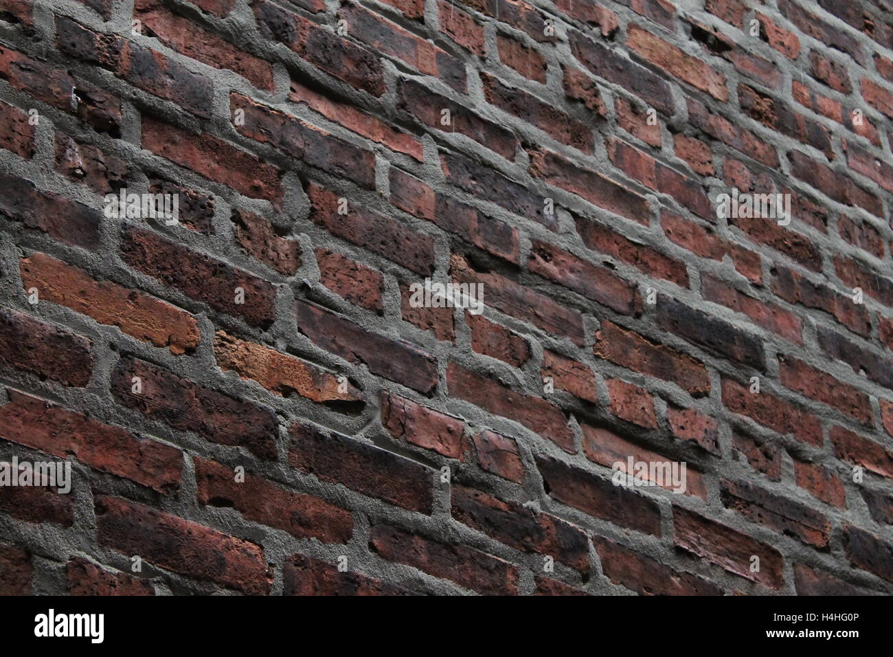 A brick wall on the side of an apartment building Stock Photo - Alamy