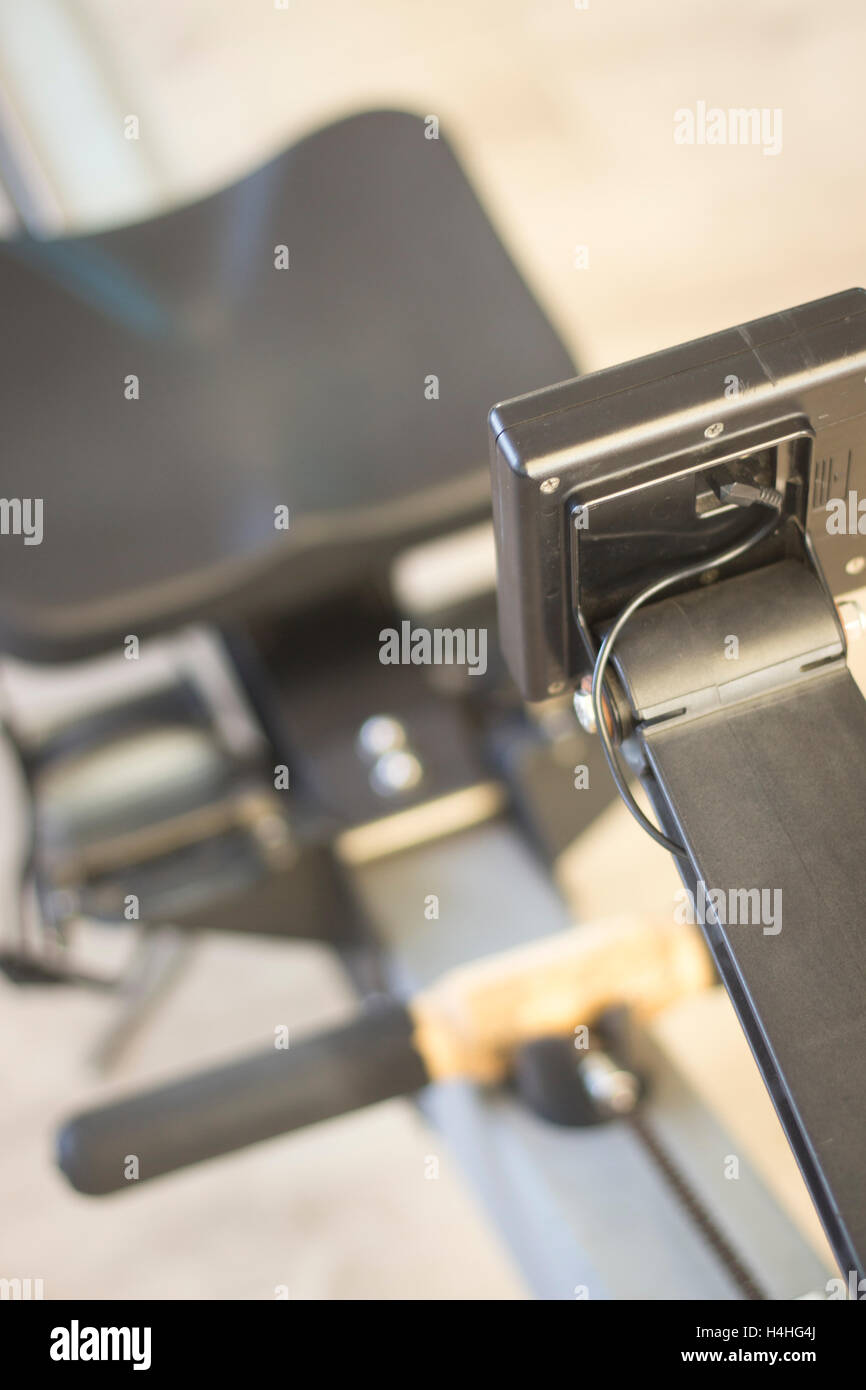 Gym exercise rowing machine static rower in gymnasium fitness studio ...