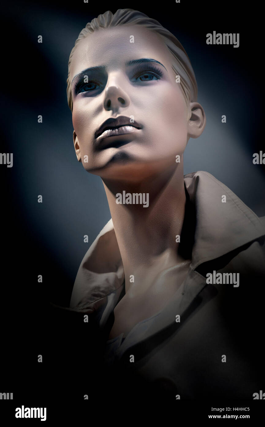 Dramatically lighted shop window dummy Stock Photo - Alamy