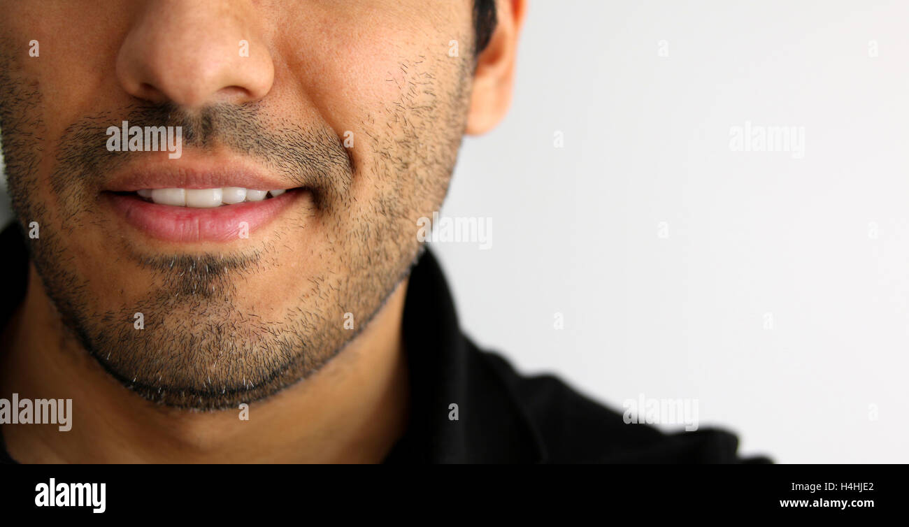 Detailed image of young man smiling with white teeth Stock Photo - Alamy