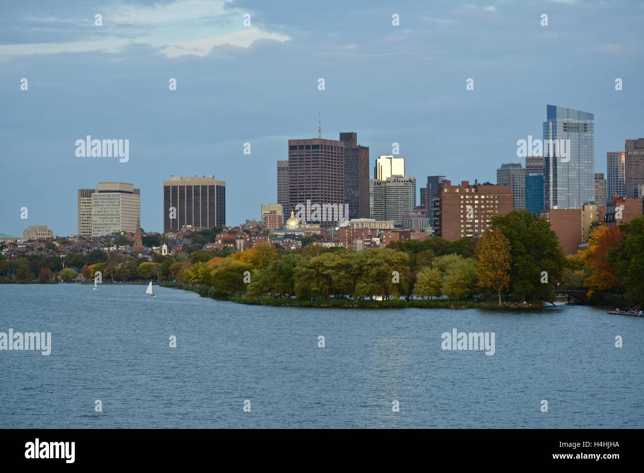 A view of the downtown Boston skyline at Sunset from Cambridge across ...