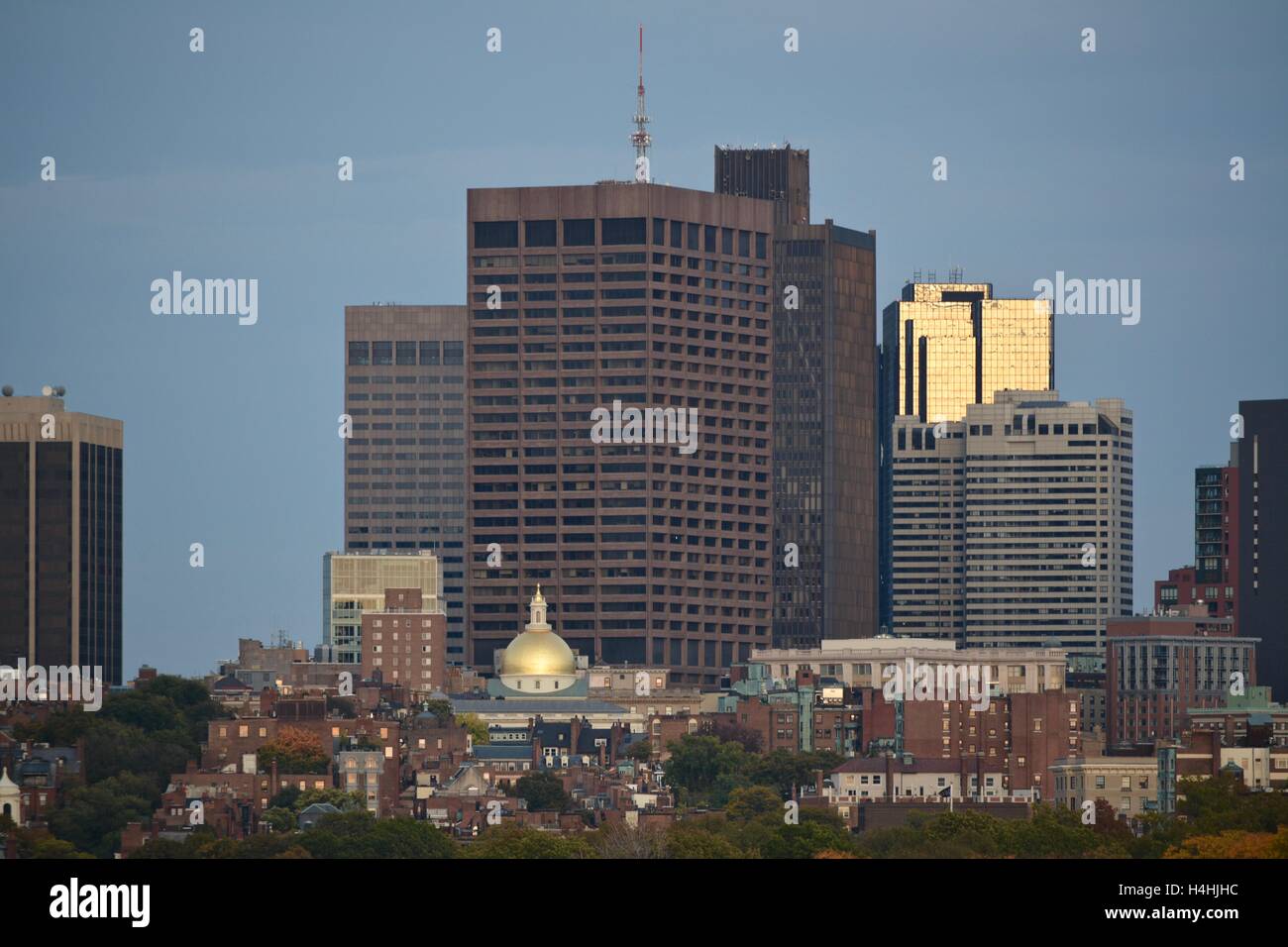 A view of the downtown Boston skyline at Sunset from Cambridge across ...