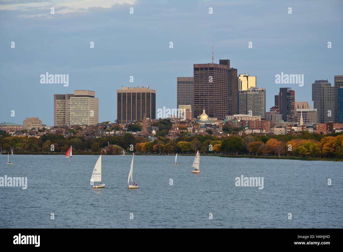 A view of the downtown Boston skyline at Sunset from Cambridge across ...