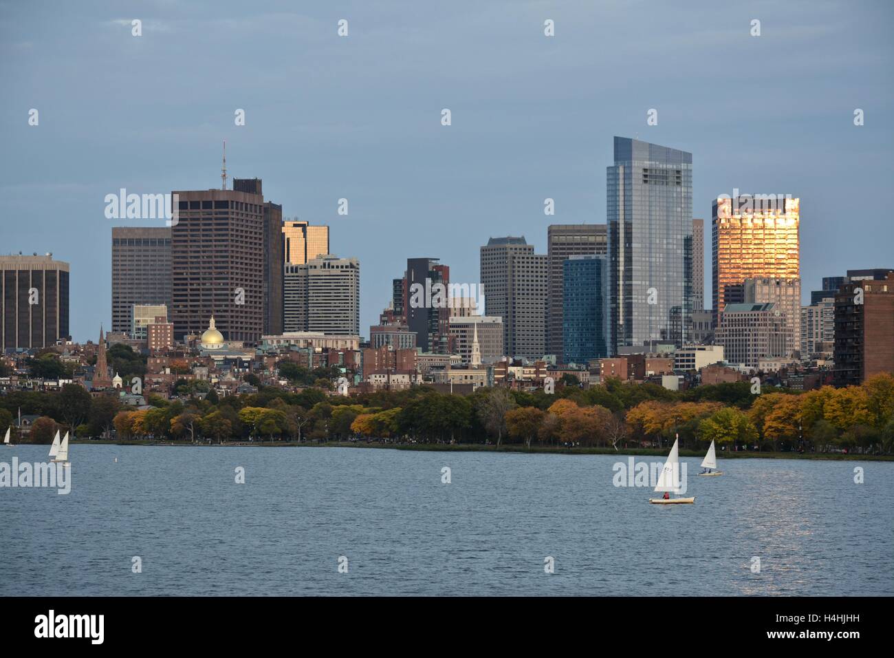 A view of the downtown Boston skyline at Sunset from Cambridge across ...