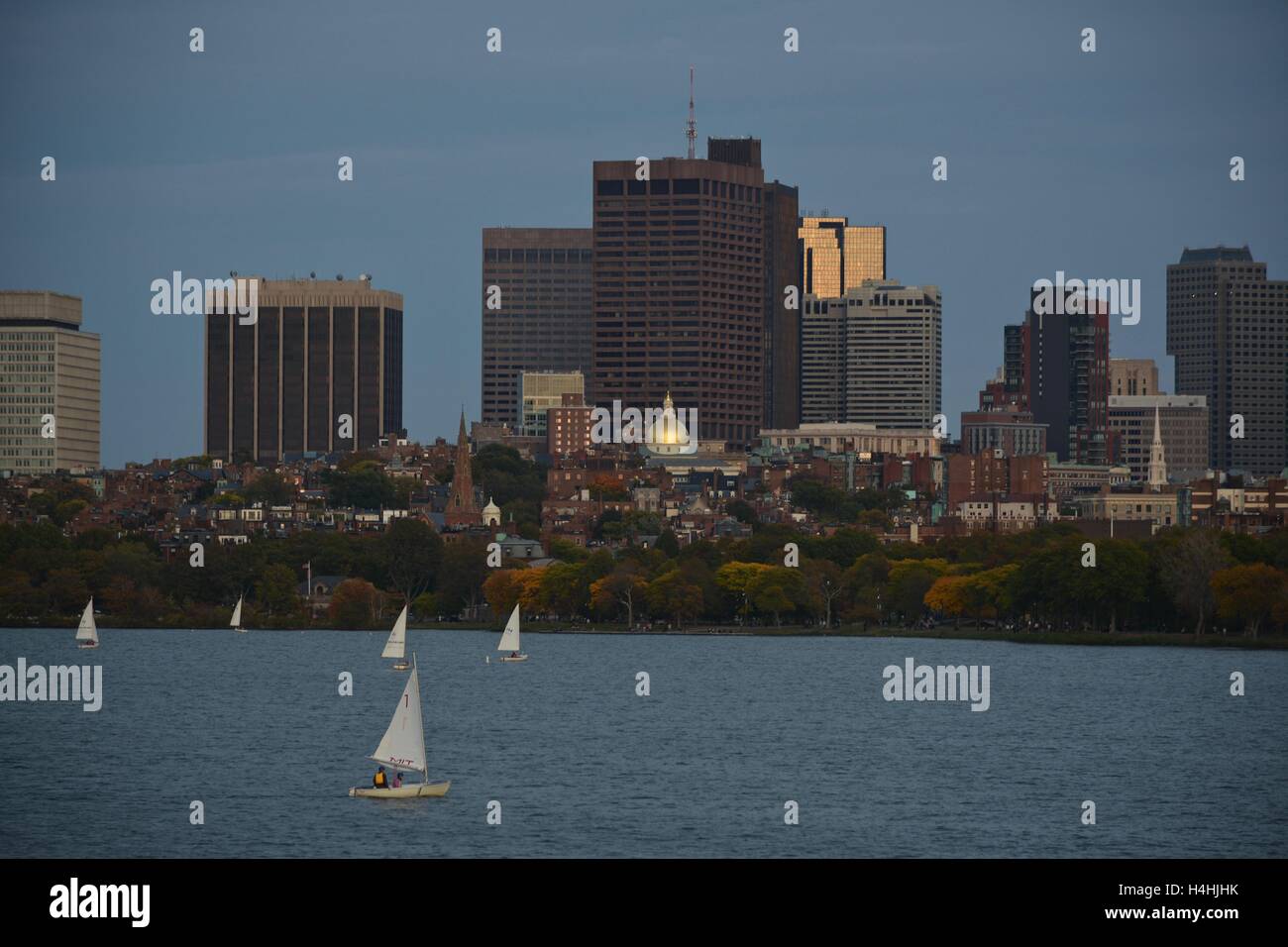 A view of the downtown Boston skyline at Sunset from Cambridge across ...