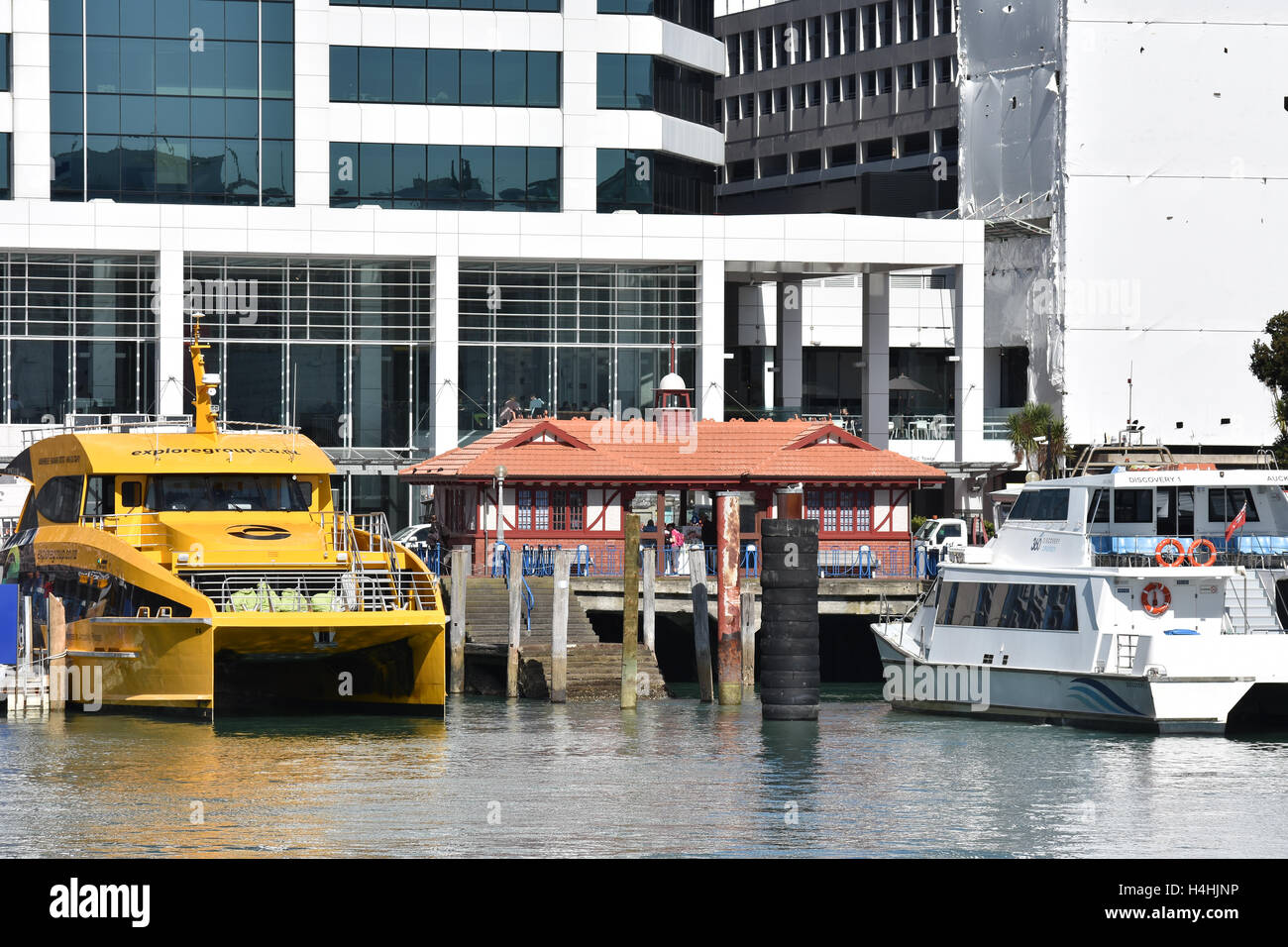 Ferries berthed at wharves in Auckland downtown (CBD Stock Photo - Alamy