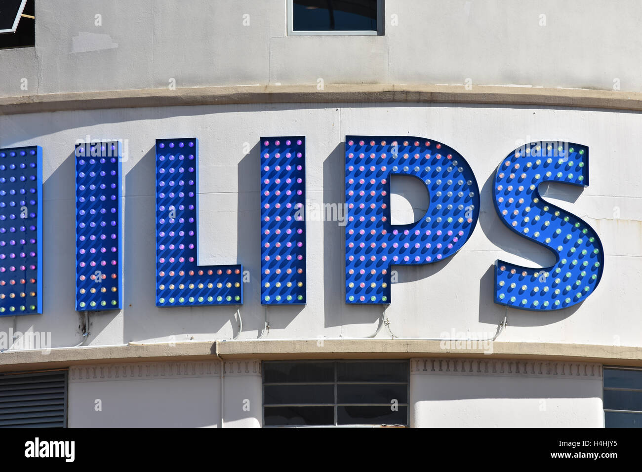 Large blue Philips exterior wall sign with tens of electric bulbs Stock ...