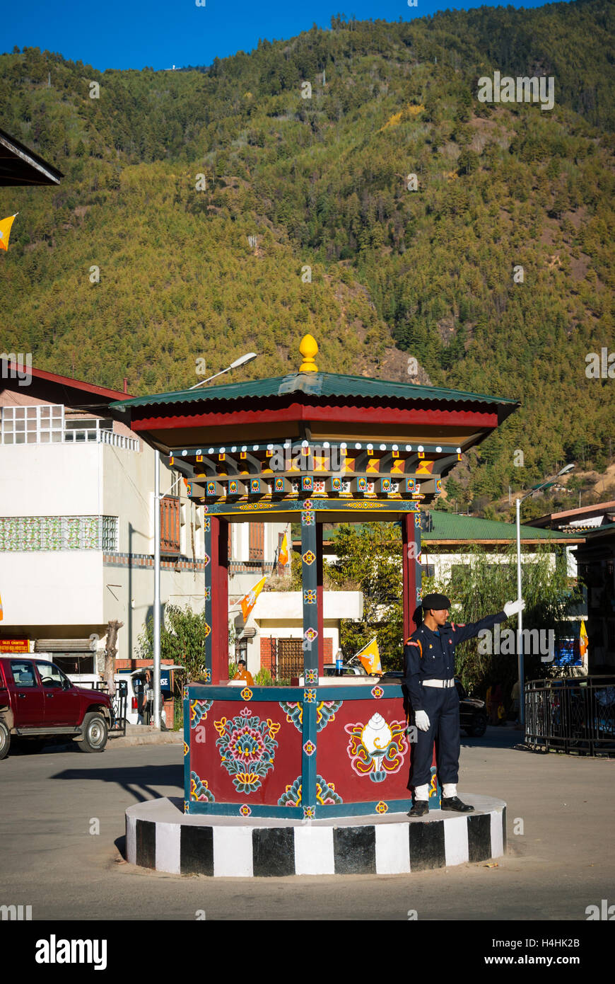 Uniformed traffic policeman directing vehicles in Thimphu, Bhutan Stock ...