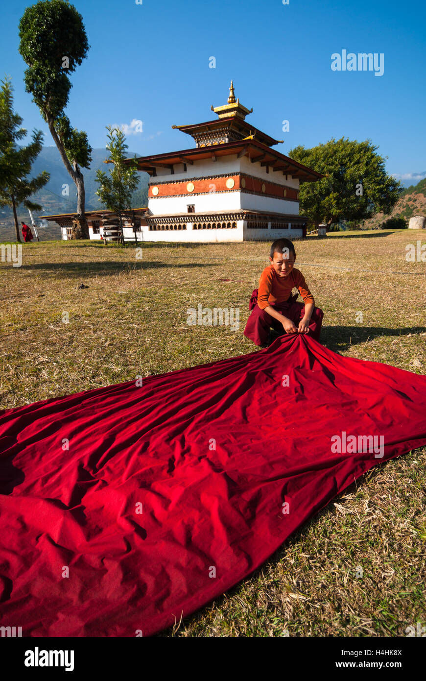 Buddhist monk red robe hi-res stock photography and images - Alamy
