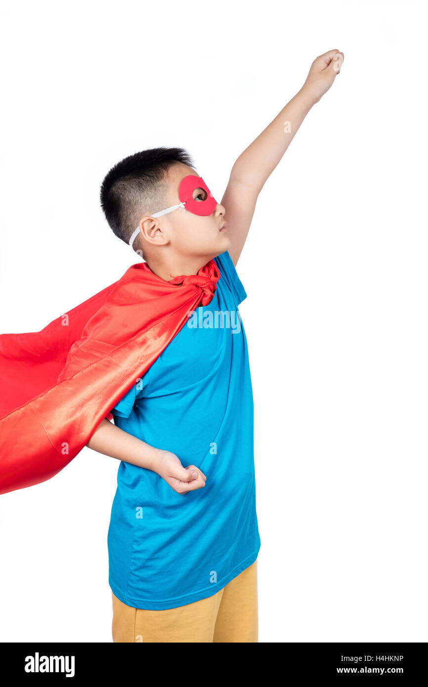Asian Chinese boy wearing super hero costume in isolated white ...