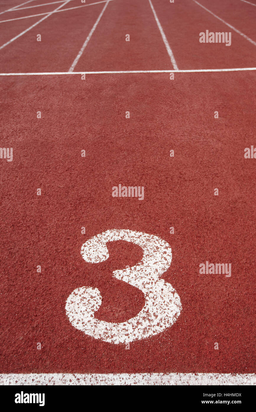 Number three signpost in an athletic running track. Vertical Stock ...