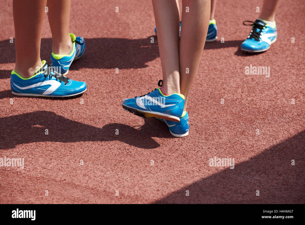 Jumping sport shoes in the athletic field ground. Horizontal Stock ...