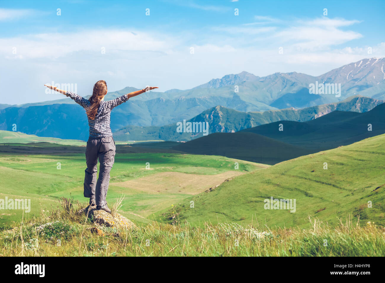 Raised hands on cloudy hi-res stock photography and images - Alamy
