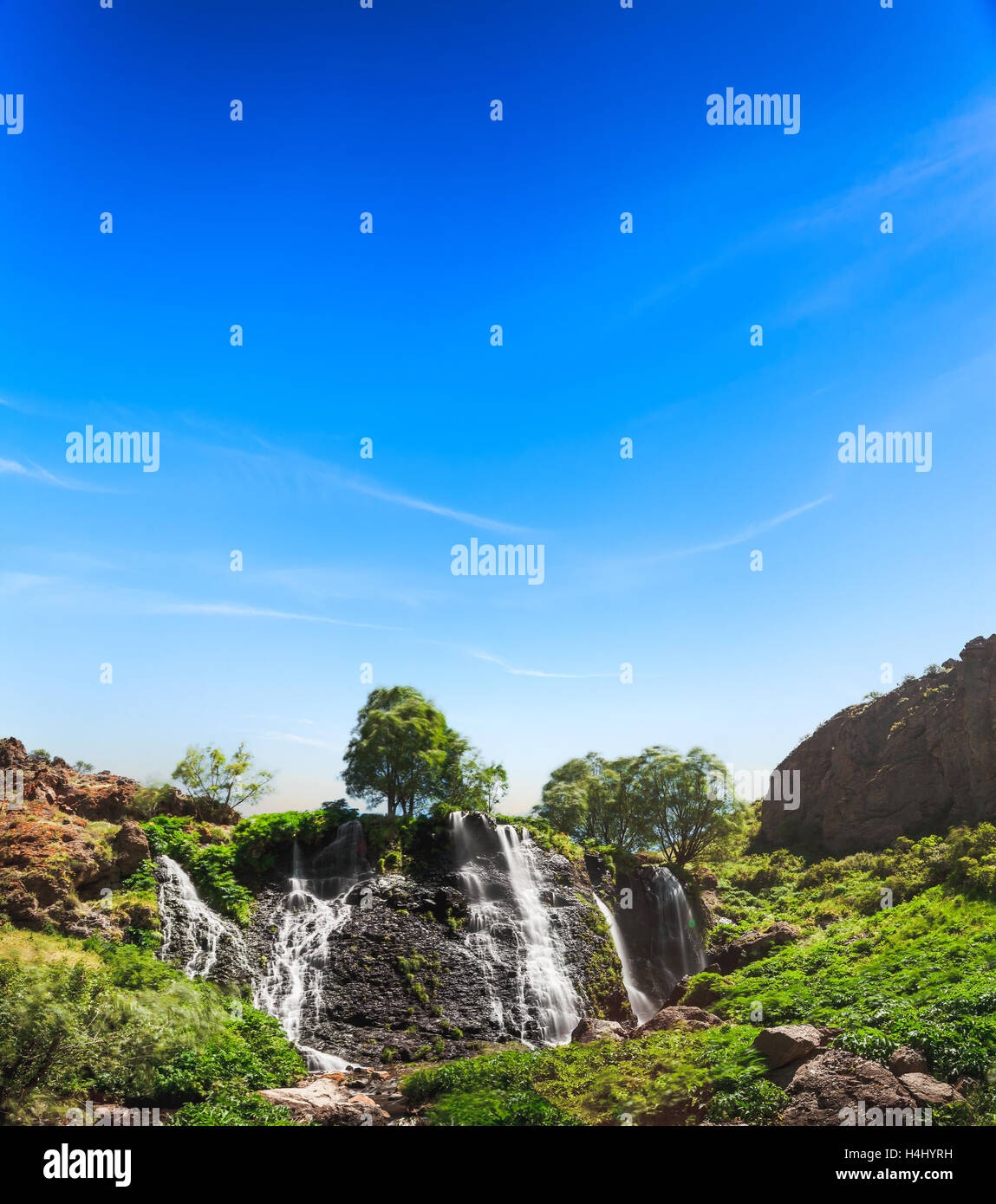 waterfall with blue sky Stock Photo - Alamy