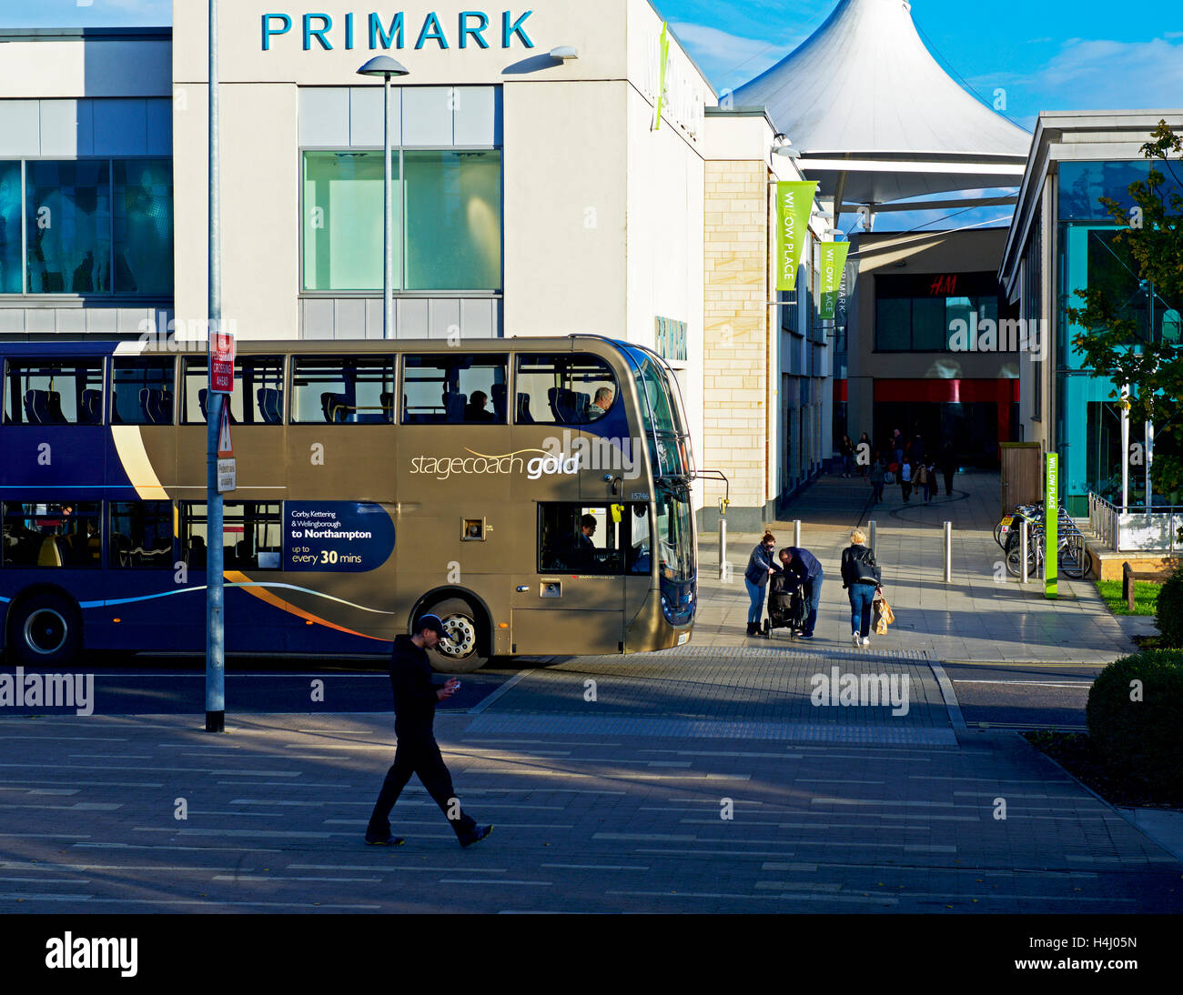 Bus outside Primark and the Willow Place Shopping Centre,Corby ...