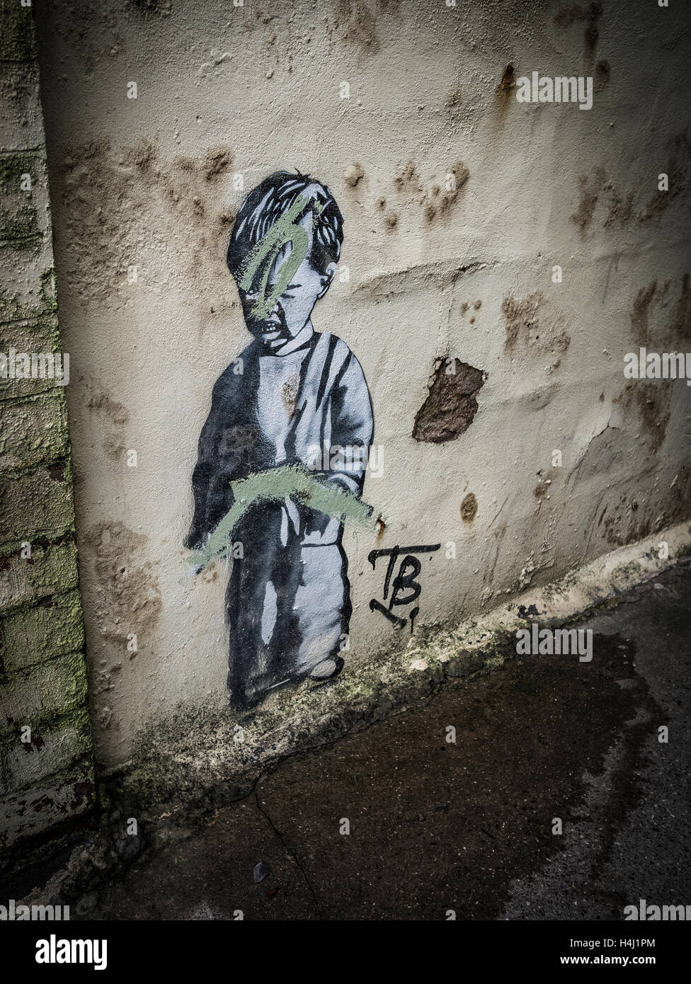 Graffiti of a little boy, on a wall at Weston-super-Mare Stock Photo ...
