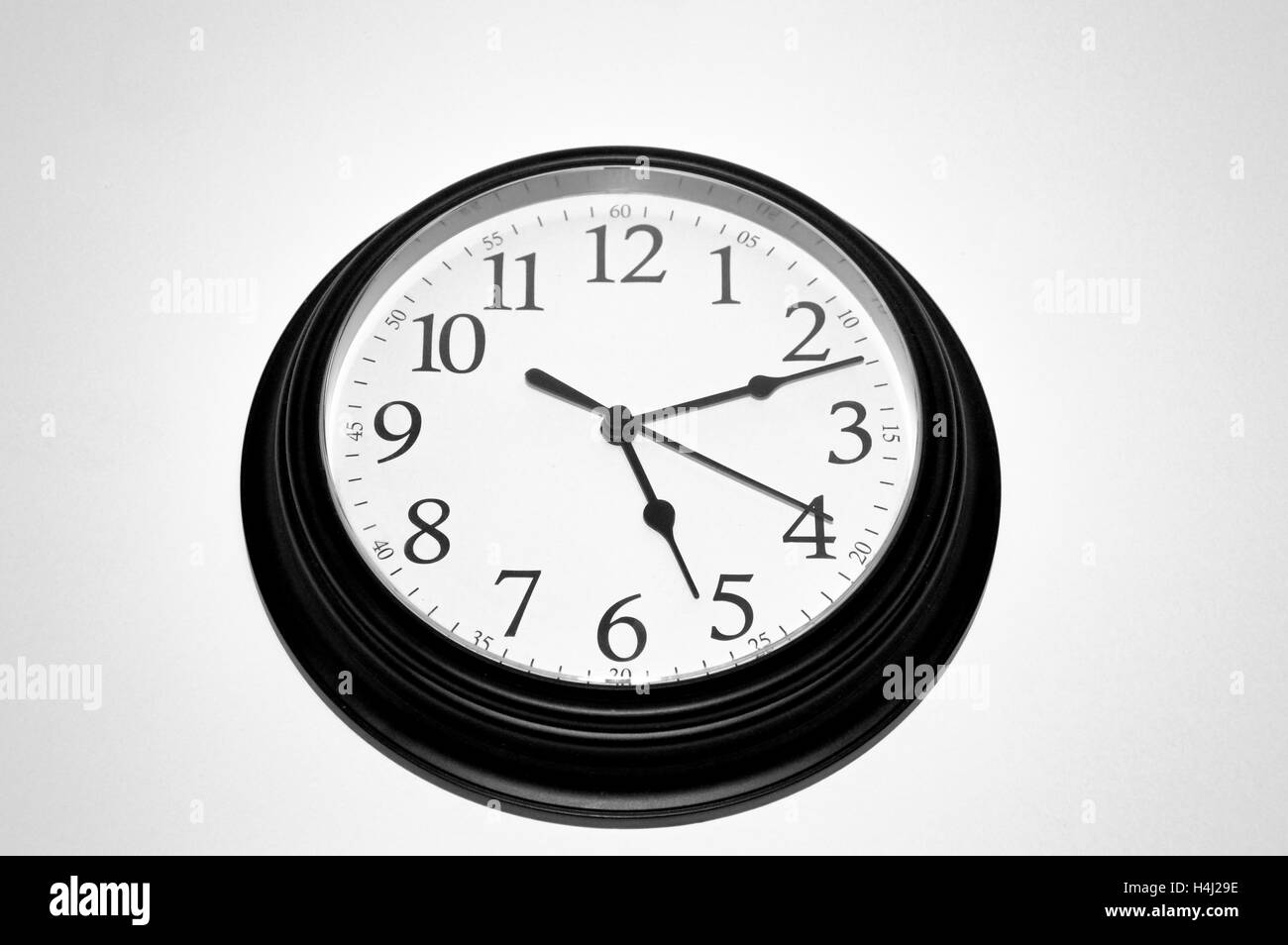 Simple wall clock hi-res stock photography and images - Alamy