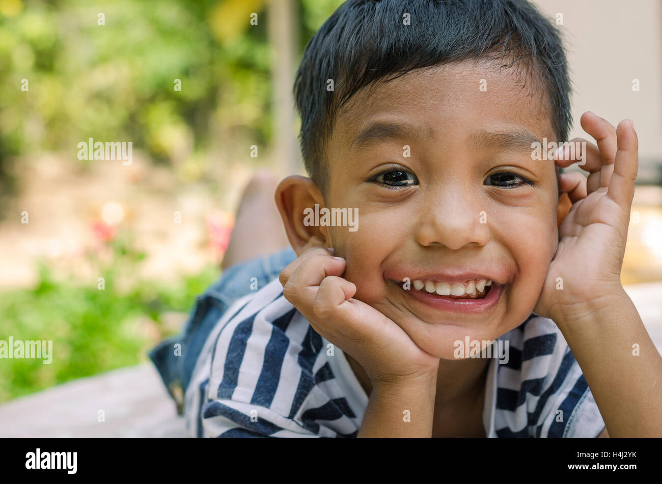 Kid asian smile hi-res stock photography and images - Alamy